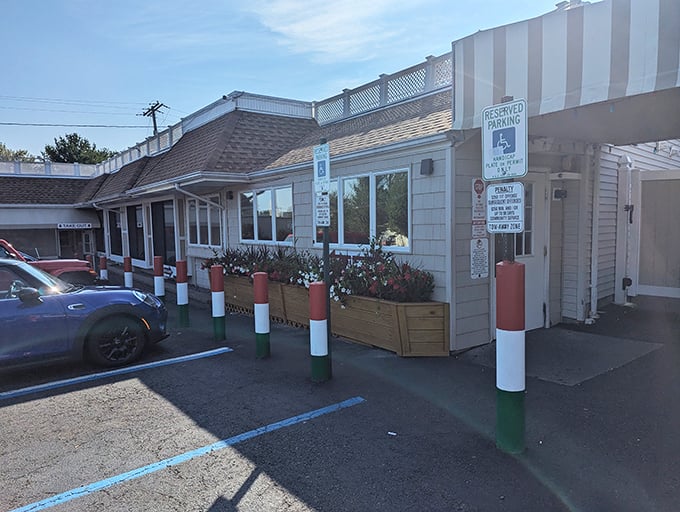 Pete & Elda's exterior welcomes pizza pilgrims with its unassuming charm. This thin-crust paradise has been a Jersey Shore institution for generations.