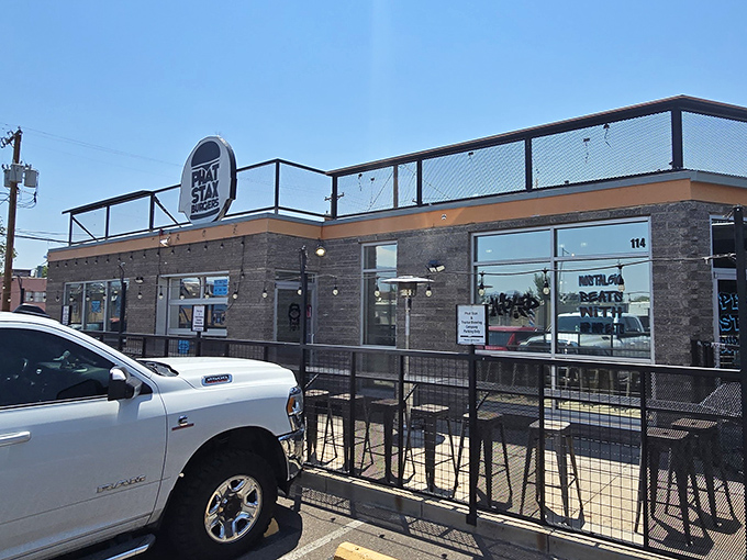 Modern meets comfort at this sleek Albuquerque spot where stone walls promise serious burger business ahead.