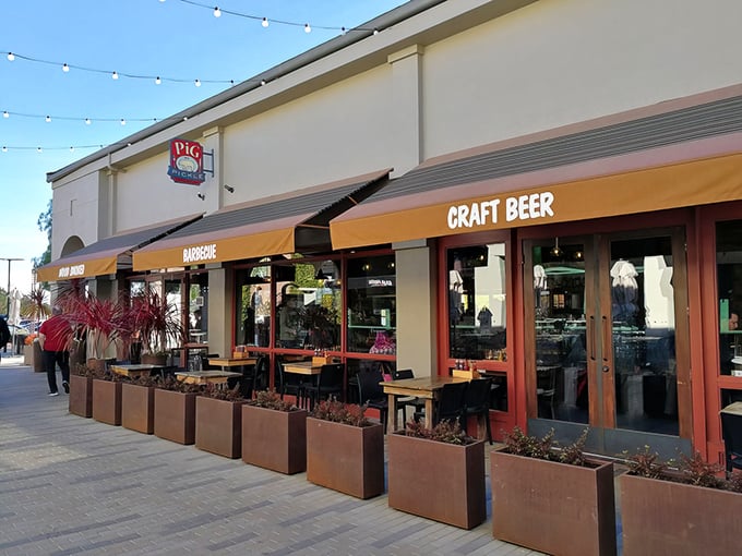 Pig in a Pickle's inviting storefront promises a barbecue adventure with craft beer as your trusty sidekick.