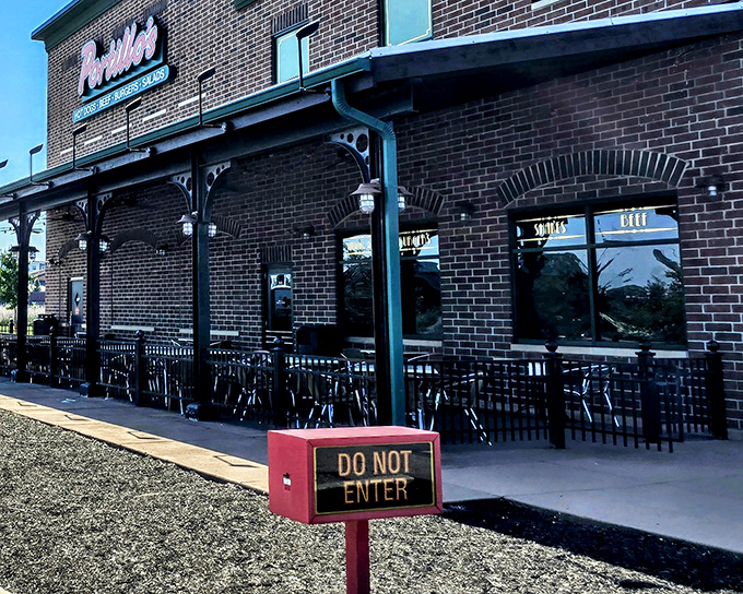 The brick exterior of Portillo's in Fishers promises Chicago-style delights within those welcoming walls.