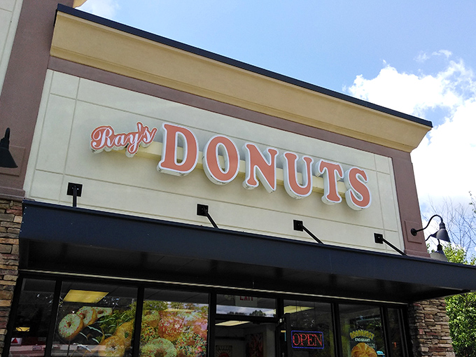 That classic sign promises exactly what you need: donuts that'll make your morning worth waking up for.