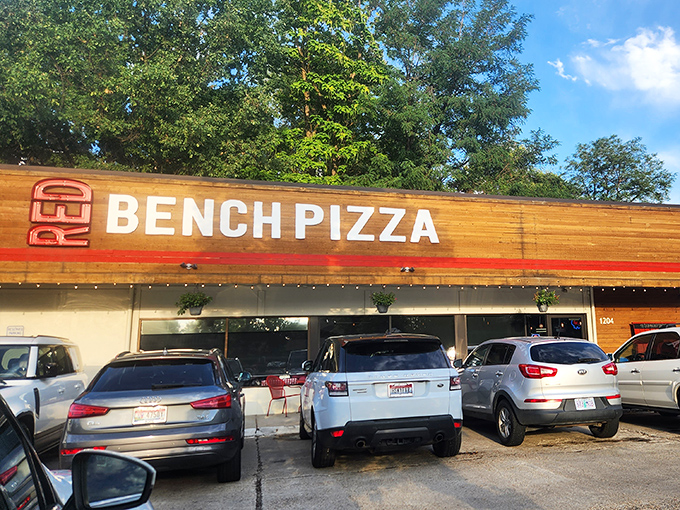Sunset casts a magical glow on Red Bench Pizza, where dough dreams come true daily.