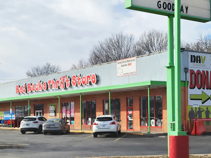 The bright red sign of Red Racks beckons like a lighthouse for bargain hunters. Those green accents add a cheerful touch to your thrifting adventure!