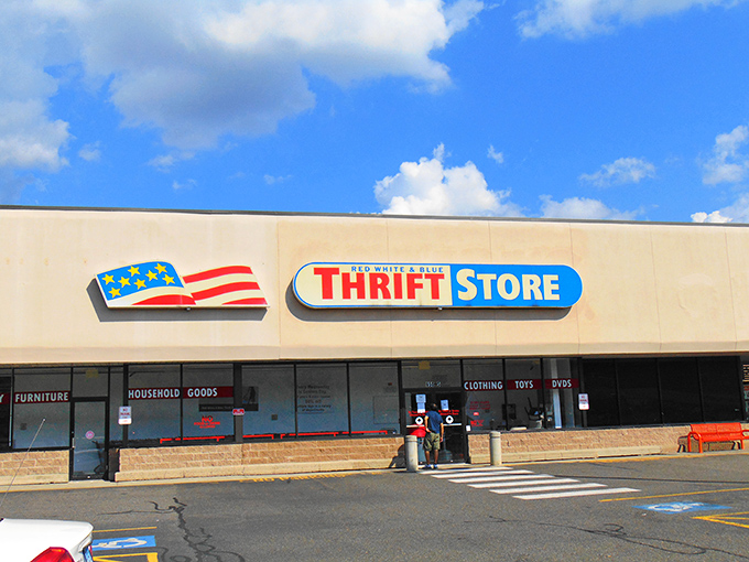 The patriotic sign says it all - Red White & Blue Thrift Store is where bargain hunters salute savings and treasure seekers find gold!