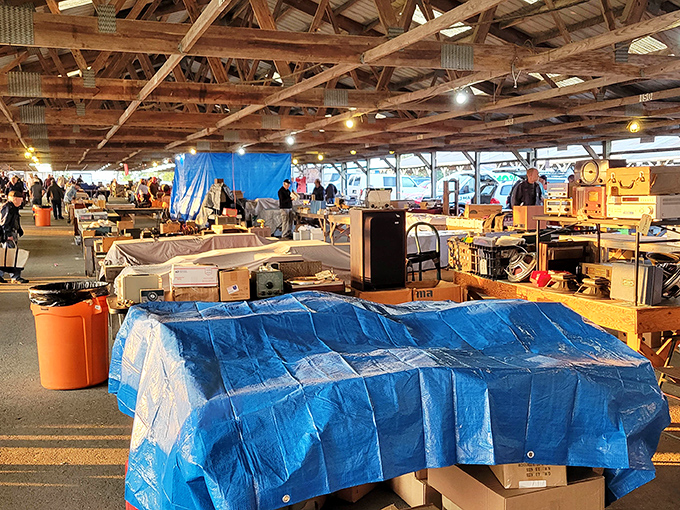 Treasure hunters paradise! Wooden beams frame endless tables of vintage finds at Renninger's, where one person's junk becomes another's joy.