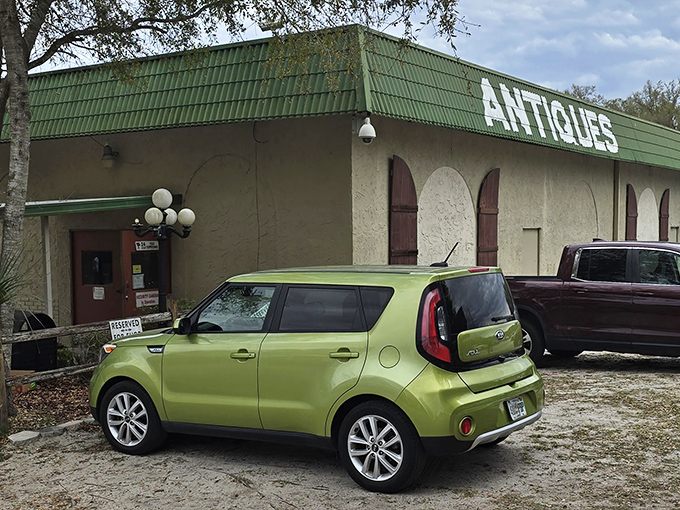 That green building holds more treasures than a pirate's chest - antiques await your discovery inside.