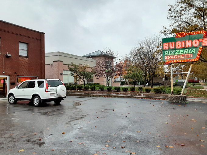 That classic neon sign promises pizza perfection - some beacons never go out of style.