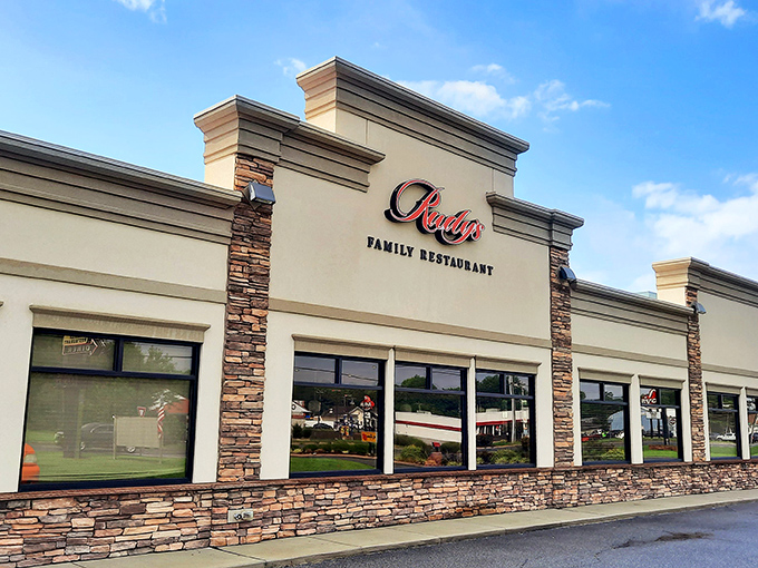 Rudy's stone facade whispers "come in" like your favorite aunt calling you to dinner.