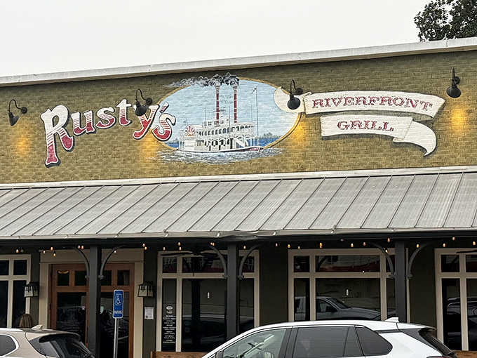 That riverboat mural hints at the maritime flavors waiting inside this Vicksburg gem.