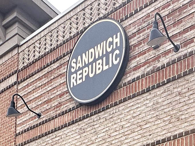 The brick facade of Sandwich Republic speaks volumes - this is where sandwich dreams come true, one perfectly stacked creation at a time.