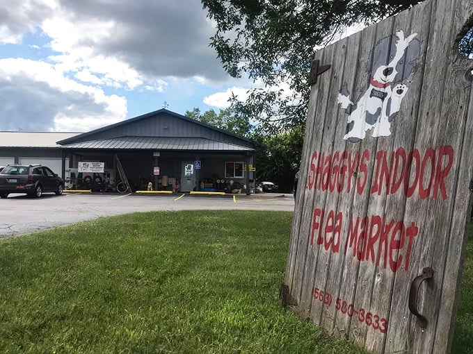 That welcoming wooden sign promises indoor treasure hunting adventures, rain or shine, at this Dubuque favorite spot.