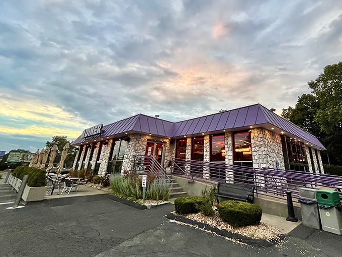 Stone walls and modern charm create the perfect breakfast backdrop at this Guilford gem.