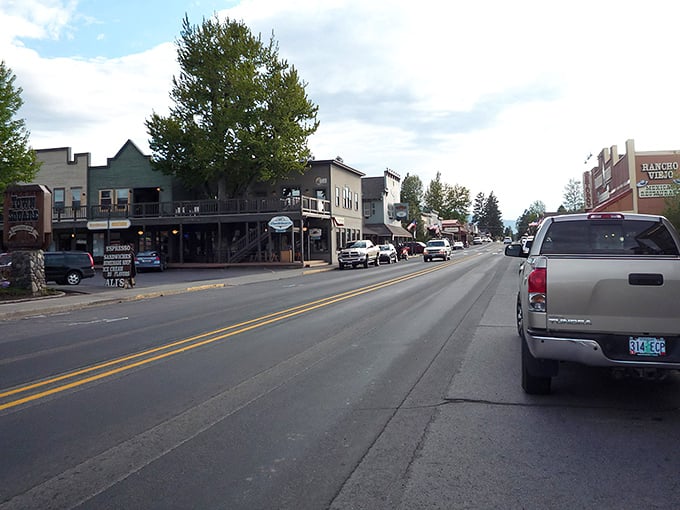 Main Street looks like a Western movie set came to life, complete with wooden storefronts and mountain views that'll make your camera beg for mercy.