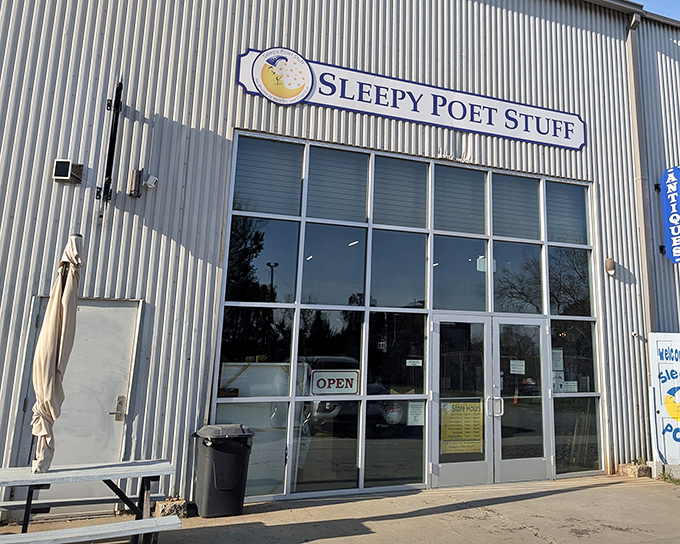 That cheerful moon logo promises sweet dreams of vintage treasures waiting inside this sprawling Charlotte antique haven.