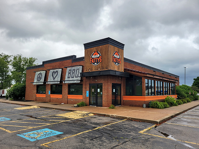 Smokin Fattys BBQ's brick-and-wood exterior promises serious BBQ business &ndash; peace, love, and smoky deliciousness await inside!