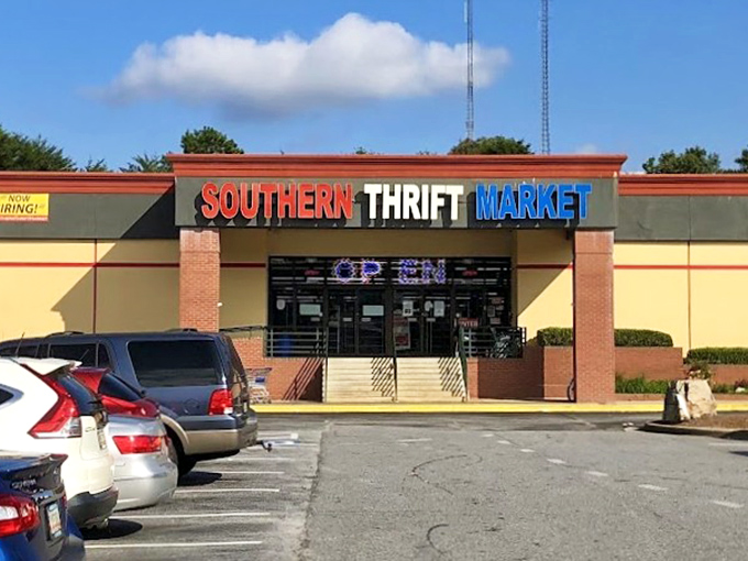 That red, white, and blue storefront promises treasures inside - like a patriotic beacon for bargain hunters everywhere.