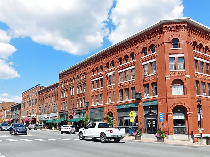 Downtown St. Johnsbury's brick buildings stand like sentinels of history, watching over a community where your dollar stretches further than your imagination.