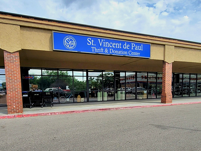 The blue sign beckons like a portal to treasure hunting adventures. St. Vincent de Paul's Boise location promises hours of thrifting bliss!