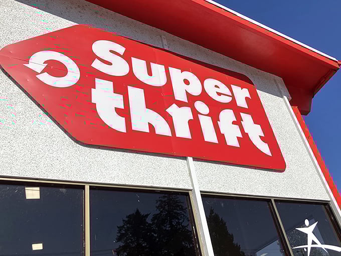 The iconic red SuperThrift sign beckons bargain hunters like a lighthouse for the budget-conscious. Treasure awaits inside!
