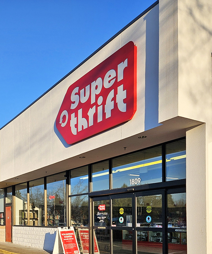 The iconic red SuperThrift sign beckons bargain hunters like a lighthouse for the budget-conscious shopper.
