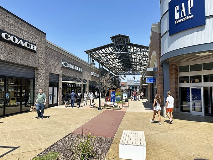 The shopping promised land! Coach and Gap face off across this sunny promenade where wallets open and credit cards tremble.