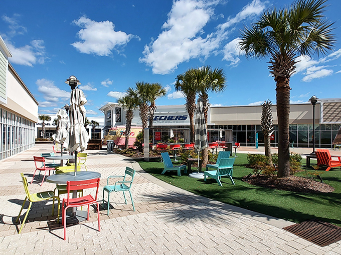 Palm trees and colorful chairs create the perfect shopping oasis where retail therapy meets vacation vibes.
