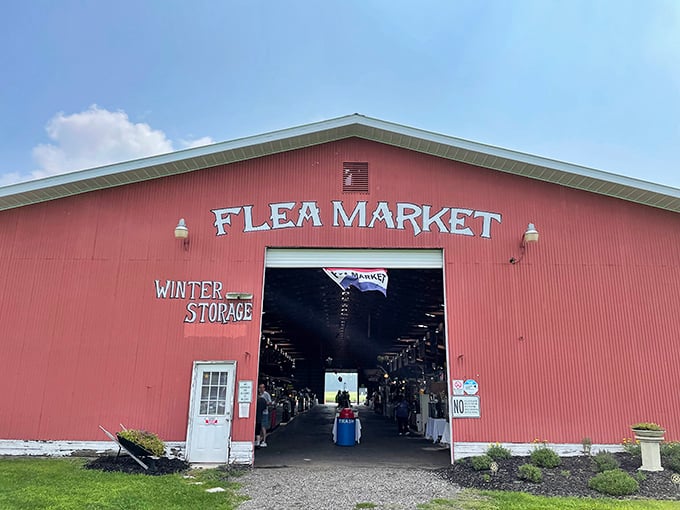 That classic red barn entrance promises treasures inside - like finding Wally, but everything's for sale!