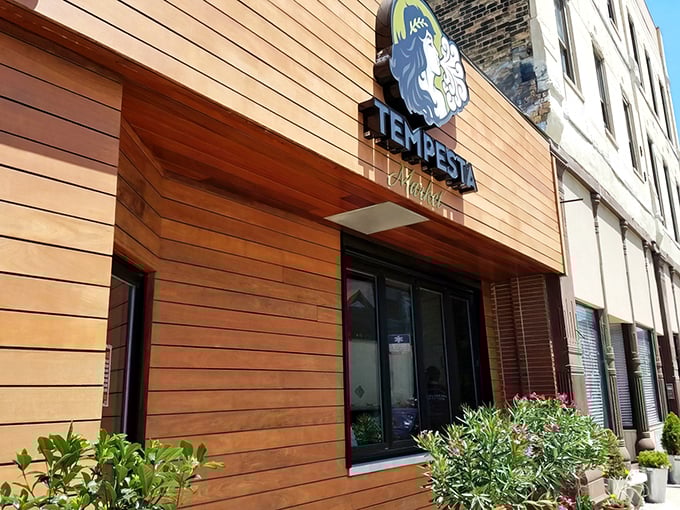 Wooden facade perfection! Tempesta Market's sleek design hints at the artisanal sandwich masterpieces waiting inside.