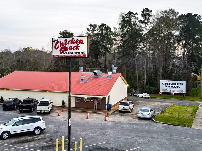 The Chicken Shack's iconic red roof and simple sign promise one thing: serious fried chicken without the fuss.