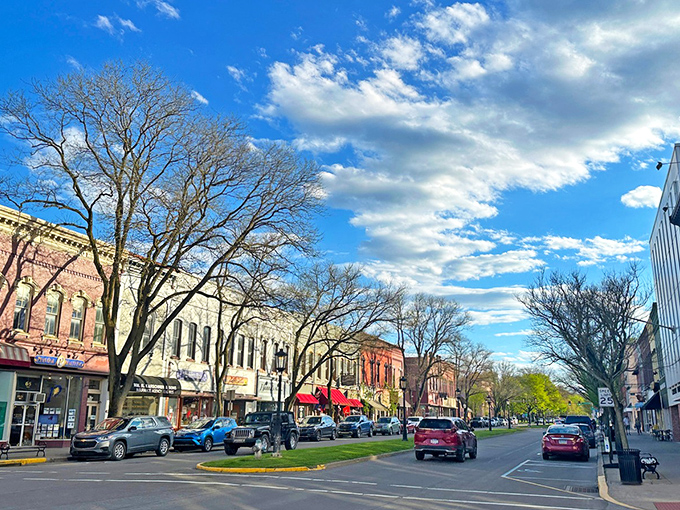 Main Street Wellsboro shines under a perfect Pennsylvania sky, where historic buildings and modern life create small-town magic that Norman Rockwell would approve of.