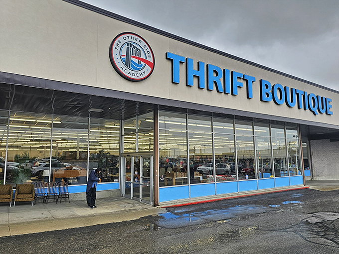 That blue storefront practically shouts "treasure hunt ahead!" - and those massive windows promise serious browsing adventures.