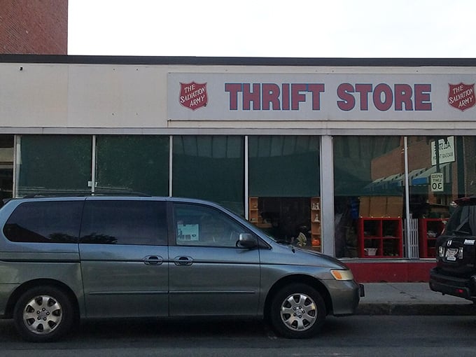 The Salvation Army storefront beckons with its bold red sign, promising treasures waiting to be discovered inside this thrift wonderland.