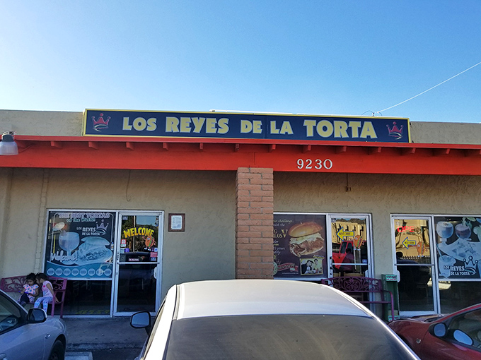 The unassuming exterior of Los Reyes de la Torta belies the flavor explosion waiting inside. Like finding a diamond in a strip mall setting.