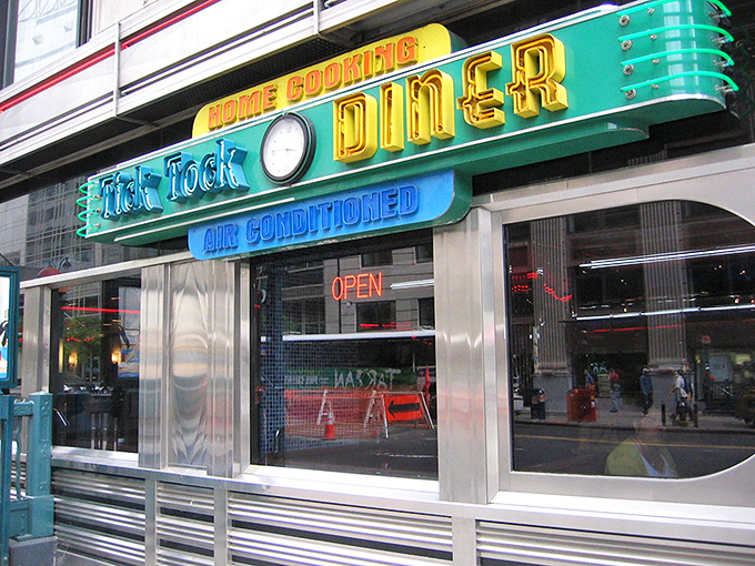 That chrome exterior gleams like a spaceship that landed in Manhattan's breakfast universe.