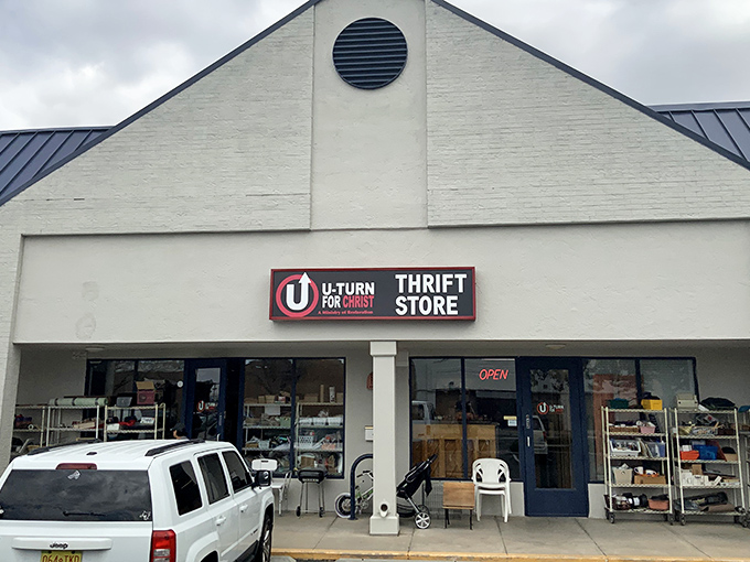 The white facade of U-Turn for Christ Thrift Store beckons like a treasure chest waiting to be opened. Bargain hunters, your paradise awaits!