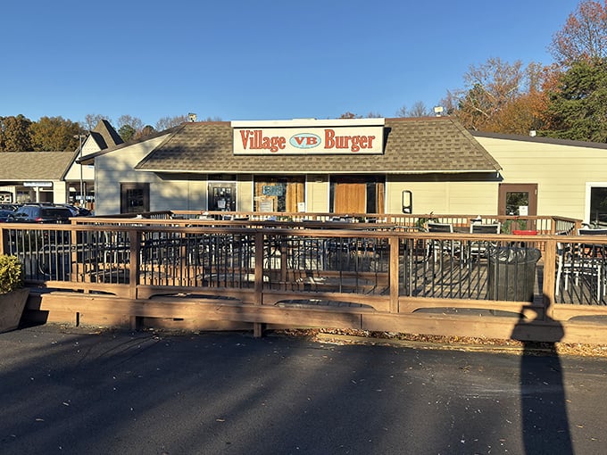 That charming Village Burger patio deck beckons like a neighborhood secret waiting to be shared.