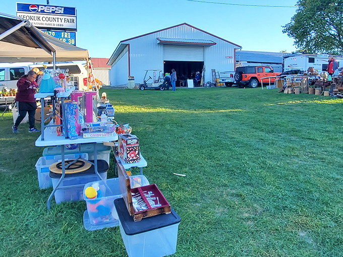 Treasure hunting at dawn! The Keokuk County Fairgrounds transforms into a bargain paradise where one person's castoffs become another's must-haves.