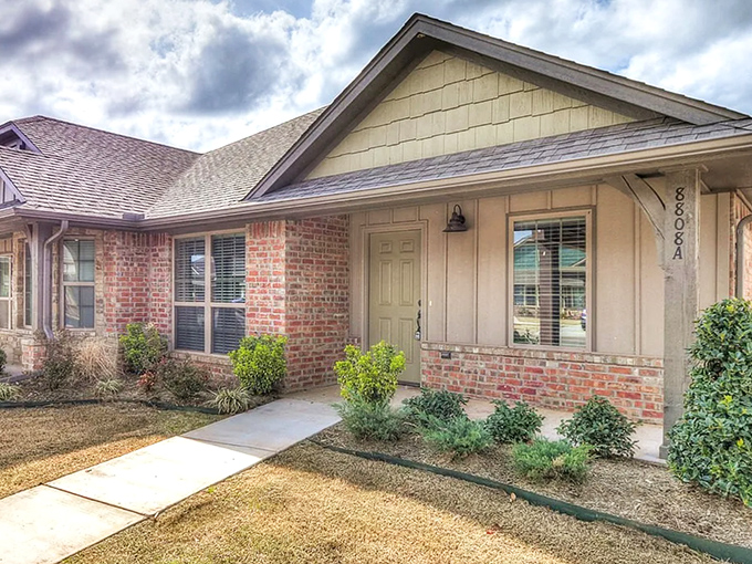 Welcome home to brick charm and manicured gardens where retirement dreams meet reality.