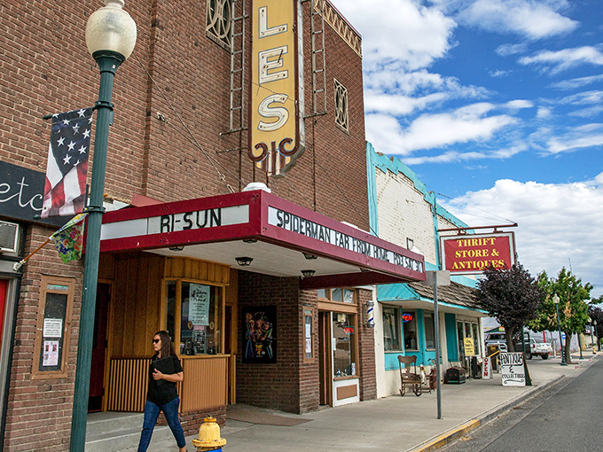 The historic Sun Theatre marquee beckons like an old friend, promising entertainment without Hollywood prices.