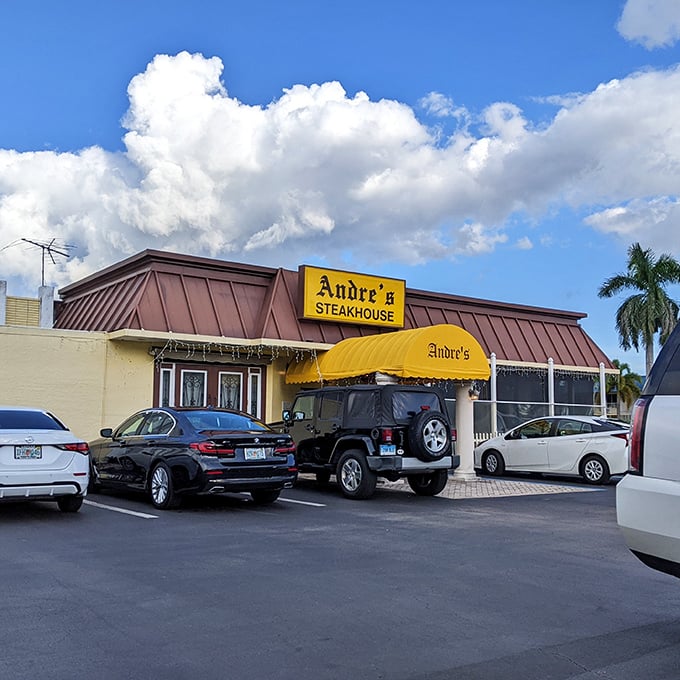 That yellow awning might not win design awards, but it signals serious steak magic inside.