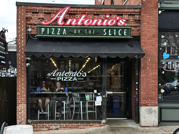 The perfect window seat at Antonio's &ndash; where pizza watching becomes a spectator sport for hungry passersby.