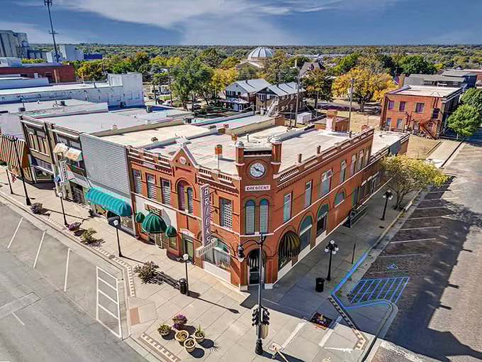 That beautiful red brick building anchors the town square with the kind of architectural dignity they don't build anymore.