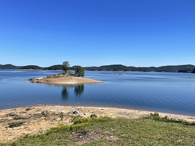 That tiny island sitting pretty in the blue expanse makes every boat feel like a private yacht.