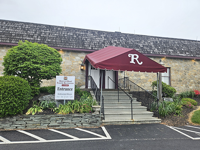 That red awning beckons like a dinner bell, promising comfort food that'll make your heart sing.