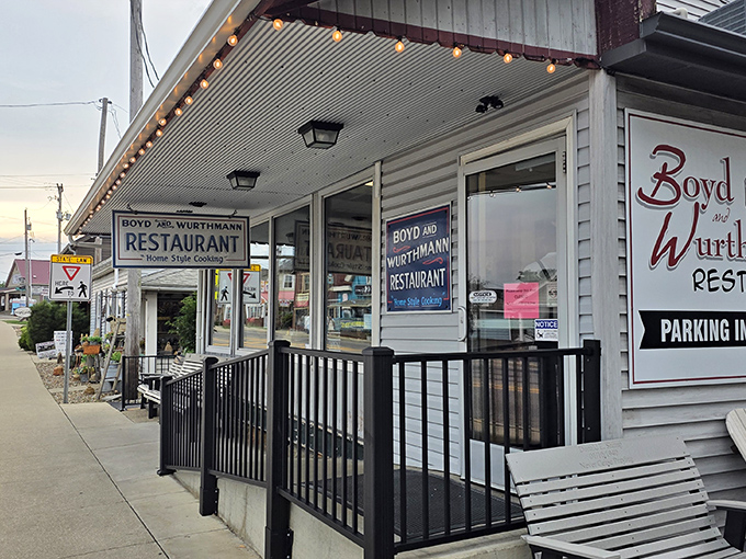 That front porch practically begs you to sit a spell before diving into some serious comfort food.