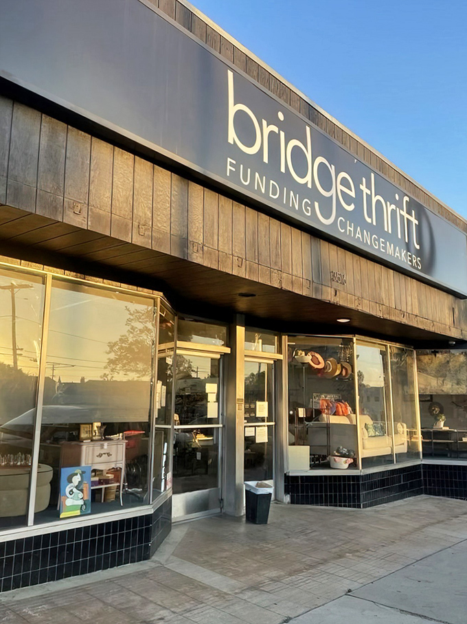 Step inside this polished thrift paradise where designer dreams meet wallet-friendly reality in perfect harmony.