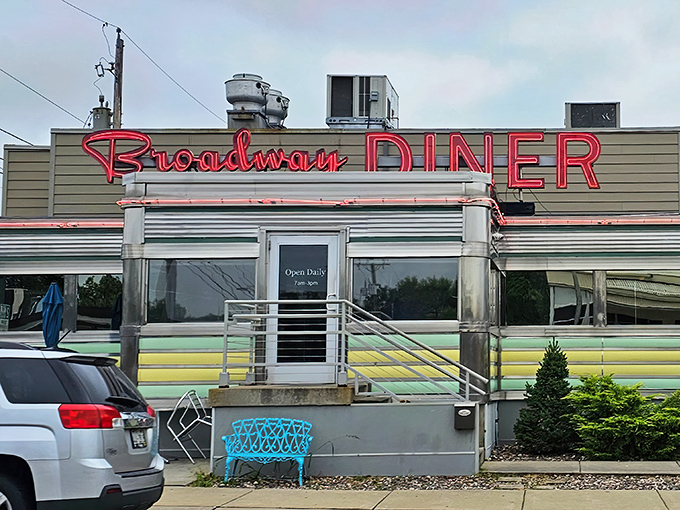 The neon "DINER" sign promises exactly what you'll get: no-nonsense comfort food that's stood the test of time.