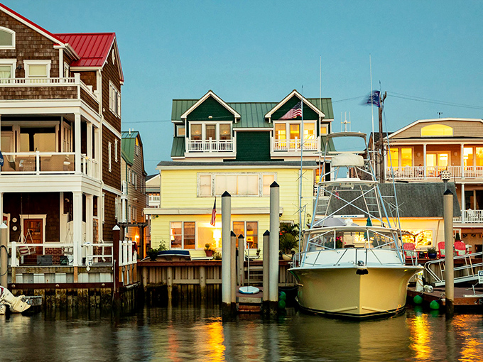 Sunset paints Cape May's harbor in golden light, where boats rest and historic homes stand as beautiful reminders of simpler times.
