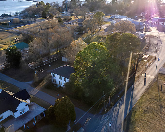 Winter sunlight dances across Cedar Bluff's affordable charm, where waterfront dreams don't require waterfront wallets.