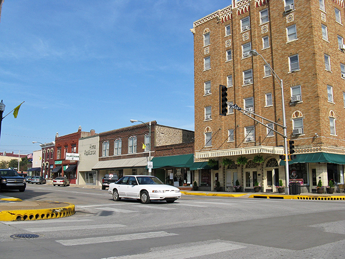 Classic brick buildings line the street like old friends, each one holding stories of simpler times.